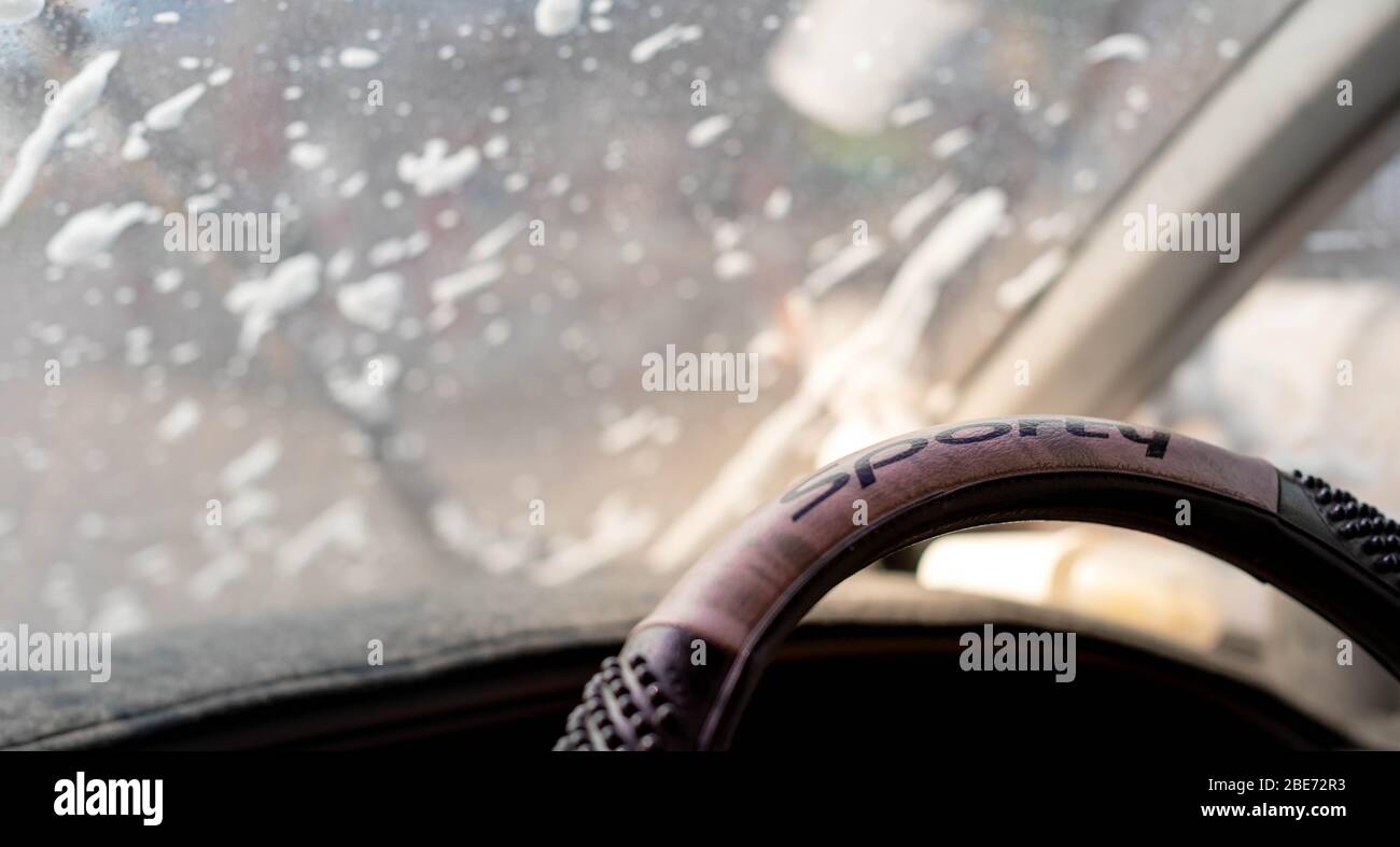 The interior inside car steering wheel with the cover for drive ...