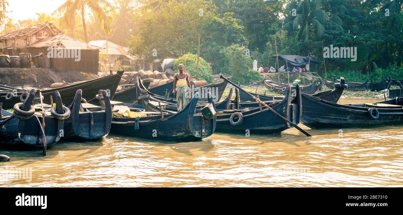 Chittagong, Bangladesh, December 22, 2017: row boats by a village on ...