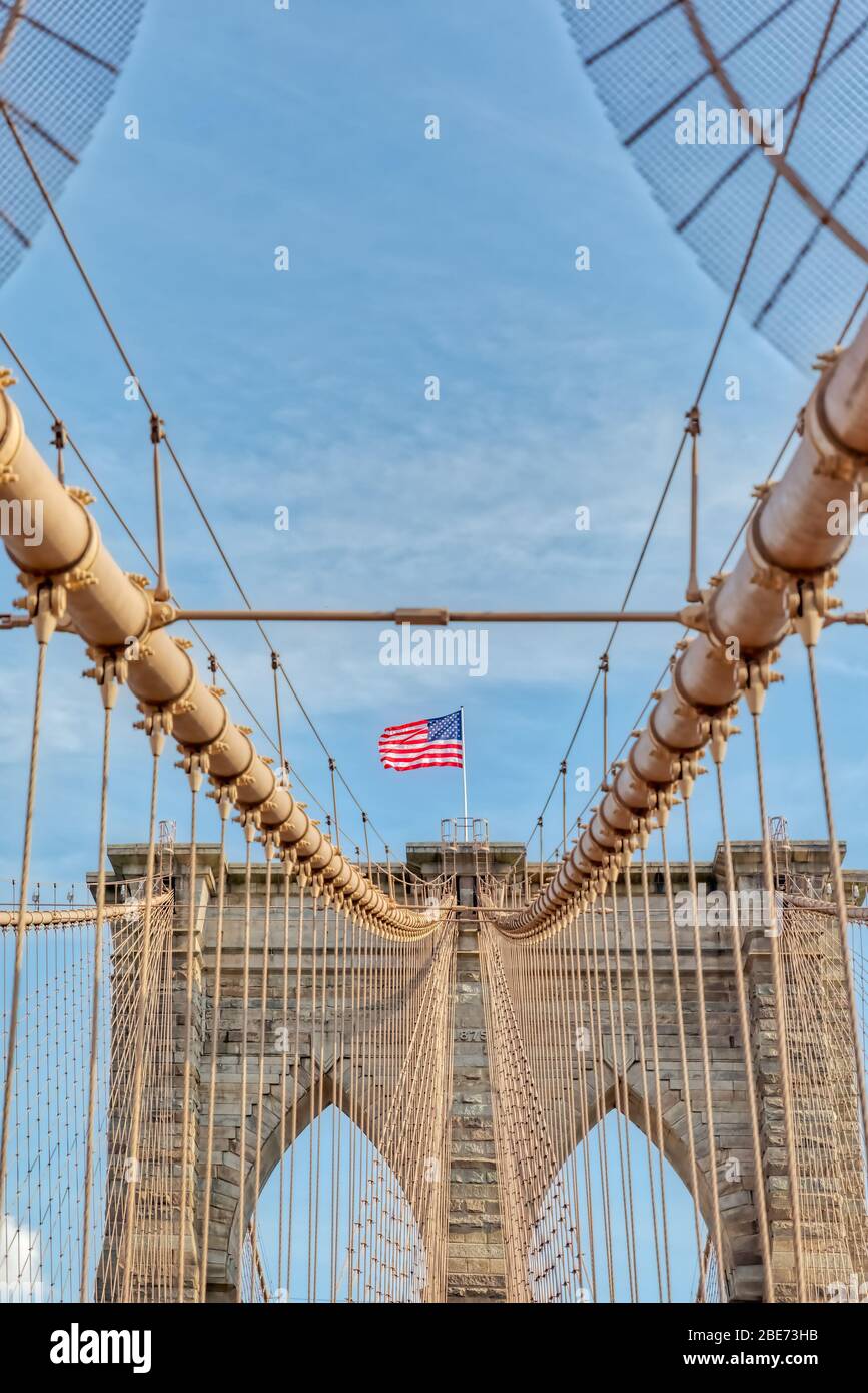 The United States flag on Brooklyn Bridge in New York Stock Photo - Alamy