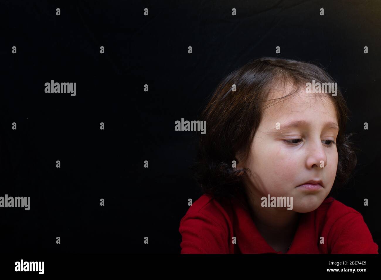 View of a crying boy studio shot Stock Photo - Alamy