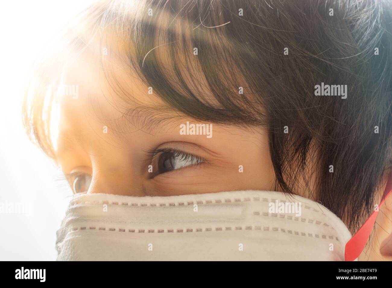 Kid wear health masks to prevent virus and germs. Disease protection ...