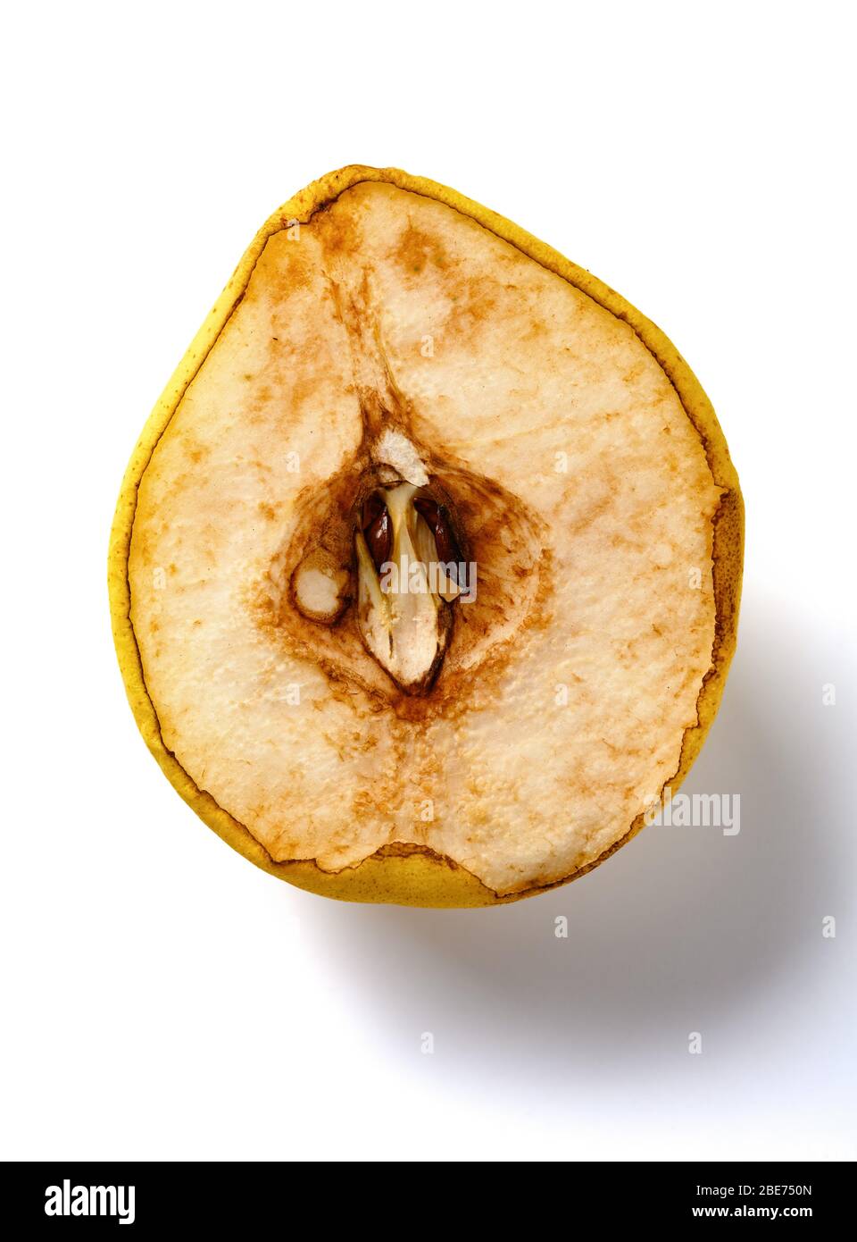 cut out section of an overripe pear on white background Stock Photo - Alamy