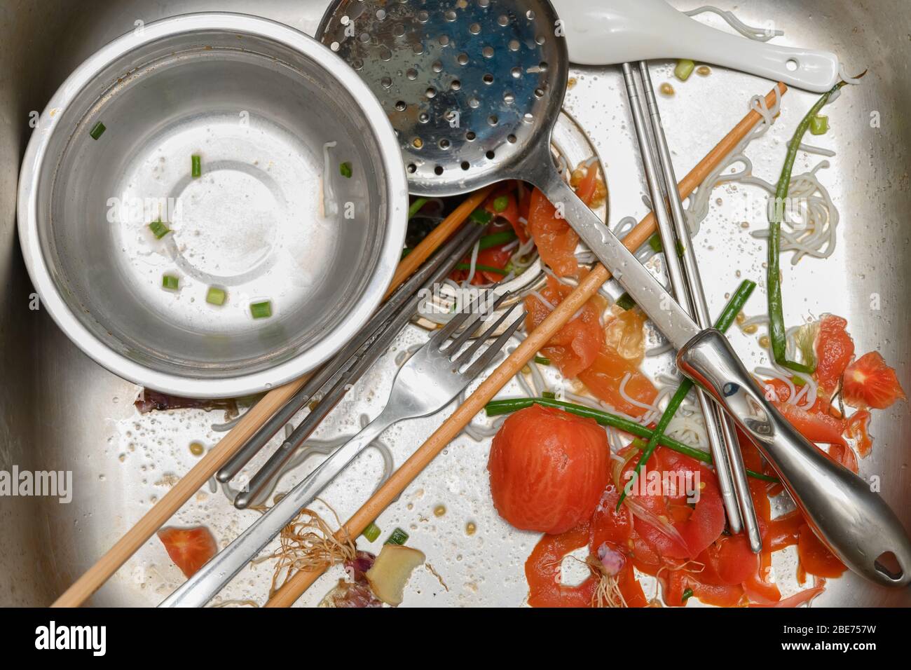 dirty sink with food waste Stock Photo - Alamy