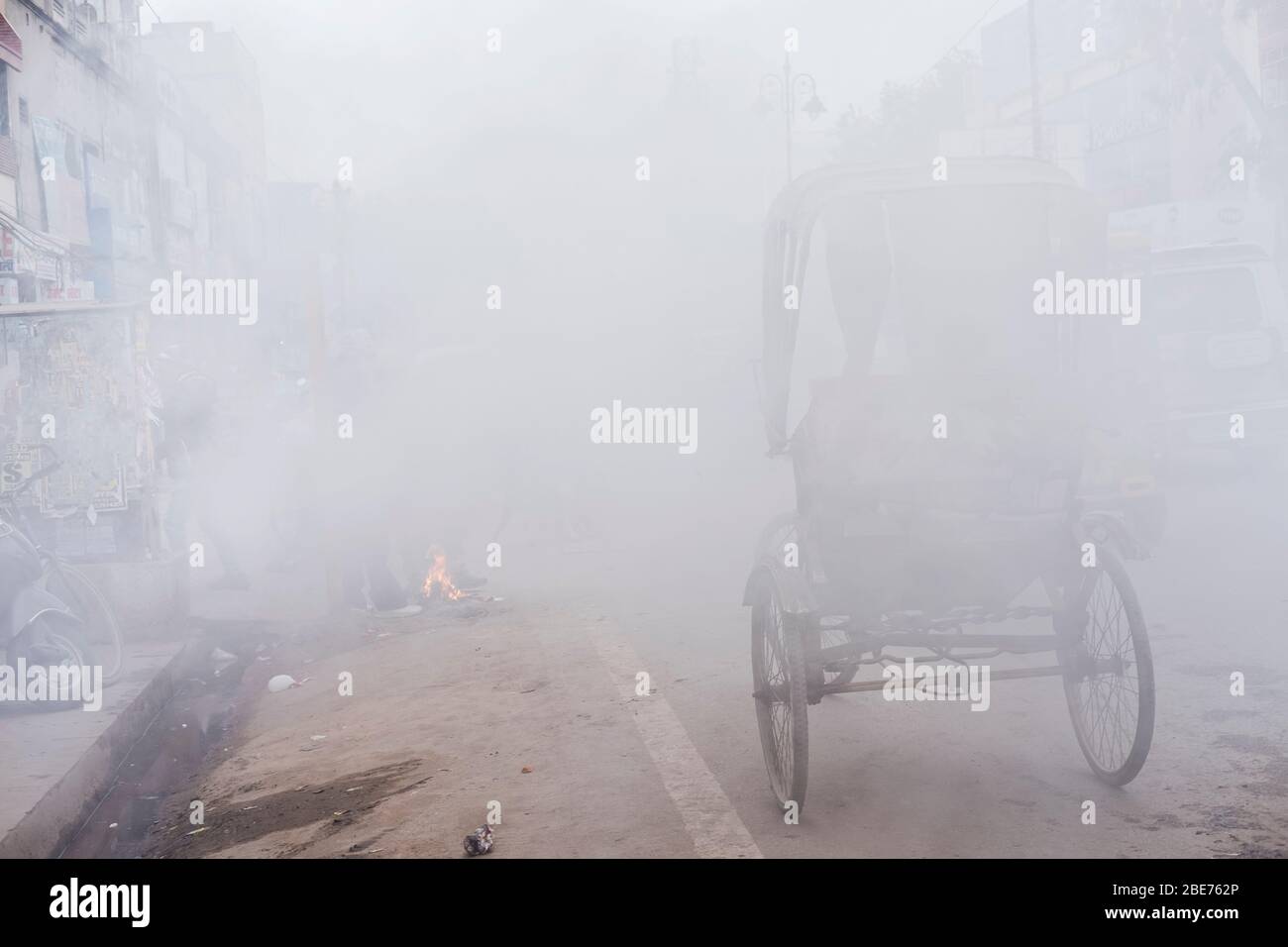 an outline of a rickshaw in thick smoke in India. Air pollution Stock ...
