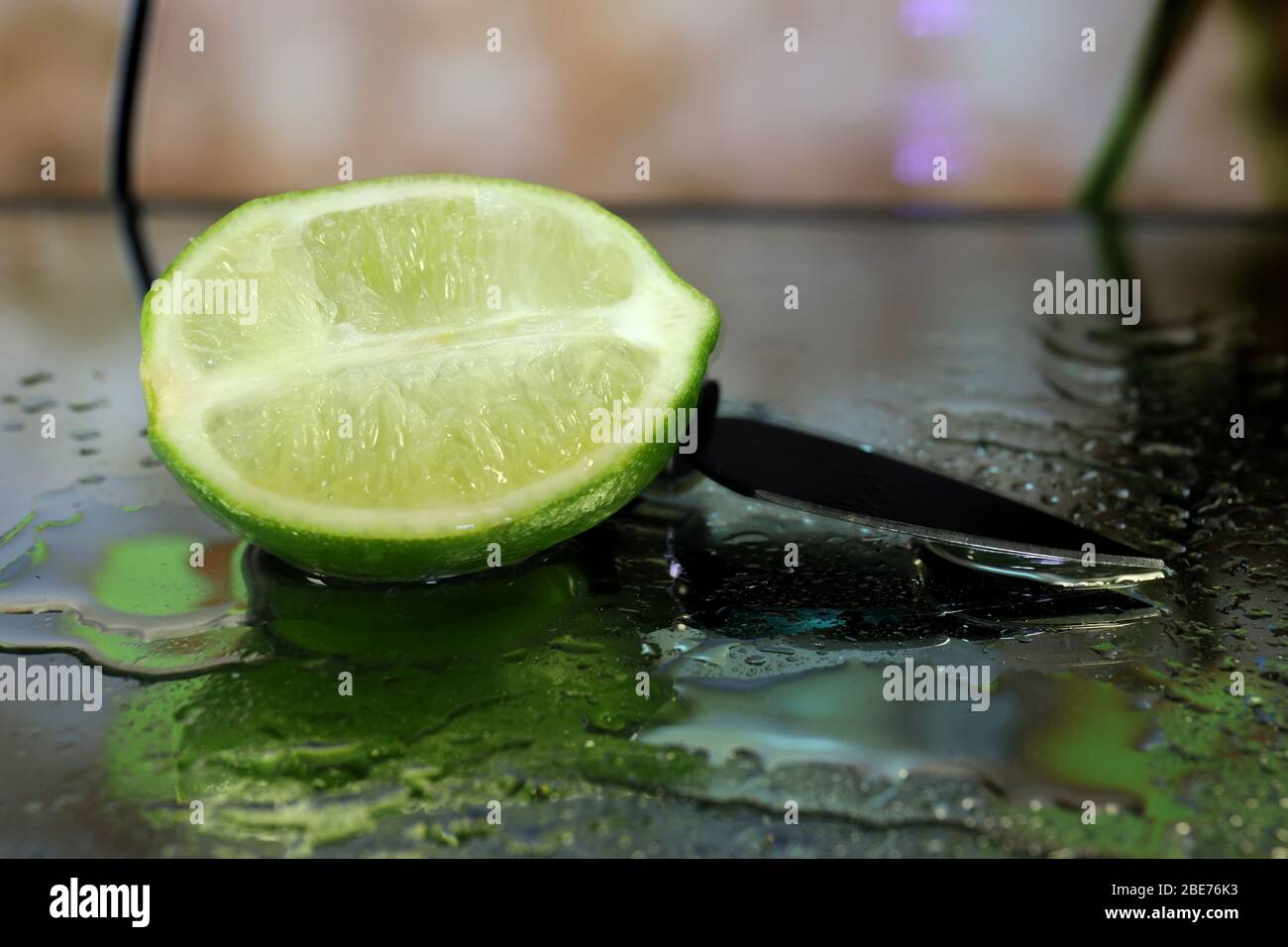 Food Photography: Delicious sliced lime sprayed with water to give a ...