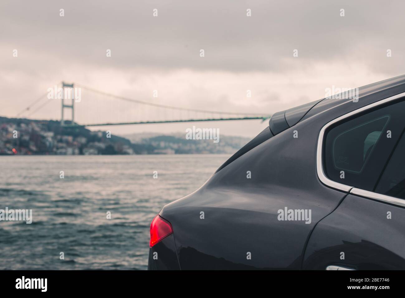 Baggage and back window of a black car from outside Stock Photo - Alamy