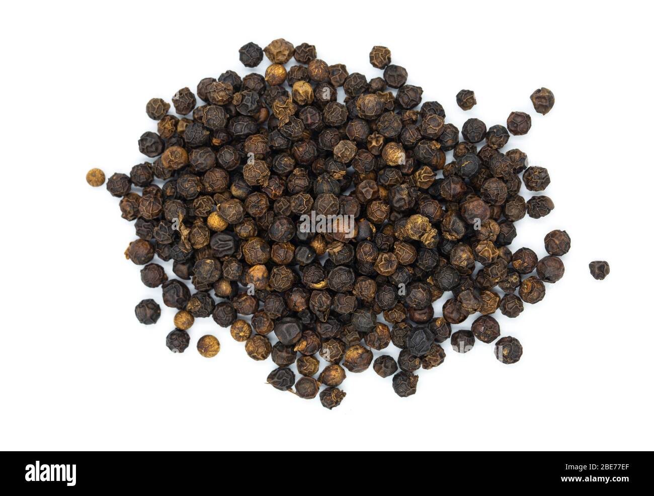 Organic raw grain black pepper heap on white background in top view ...