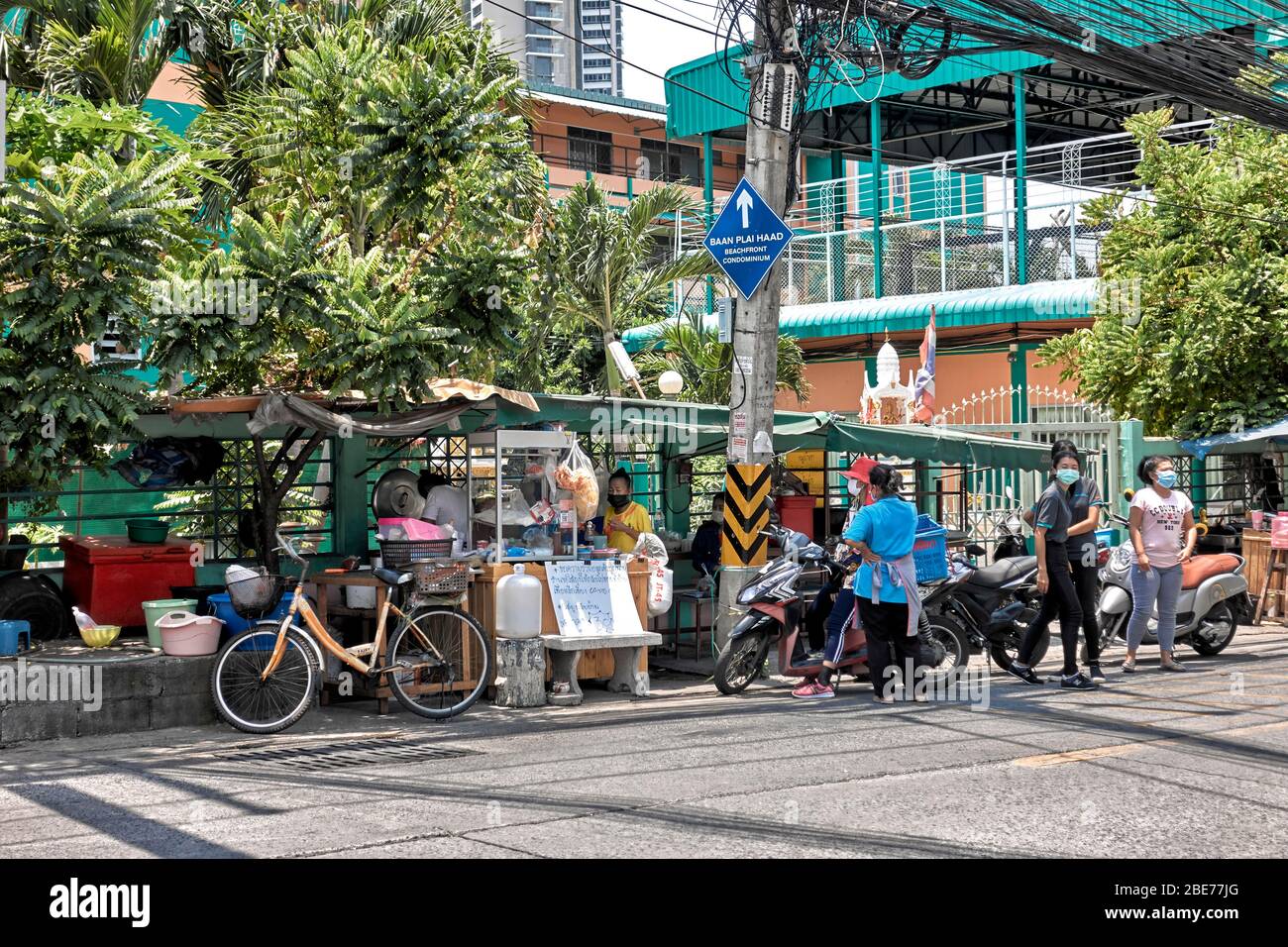Face masks. COVID-19 . Thailand street food vendor with customers ...