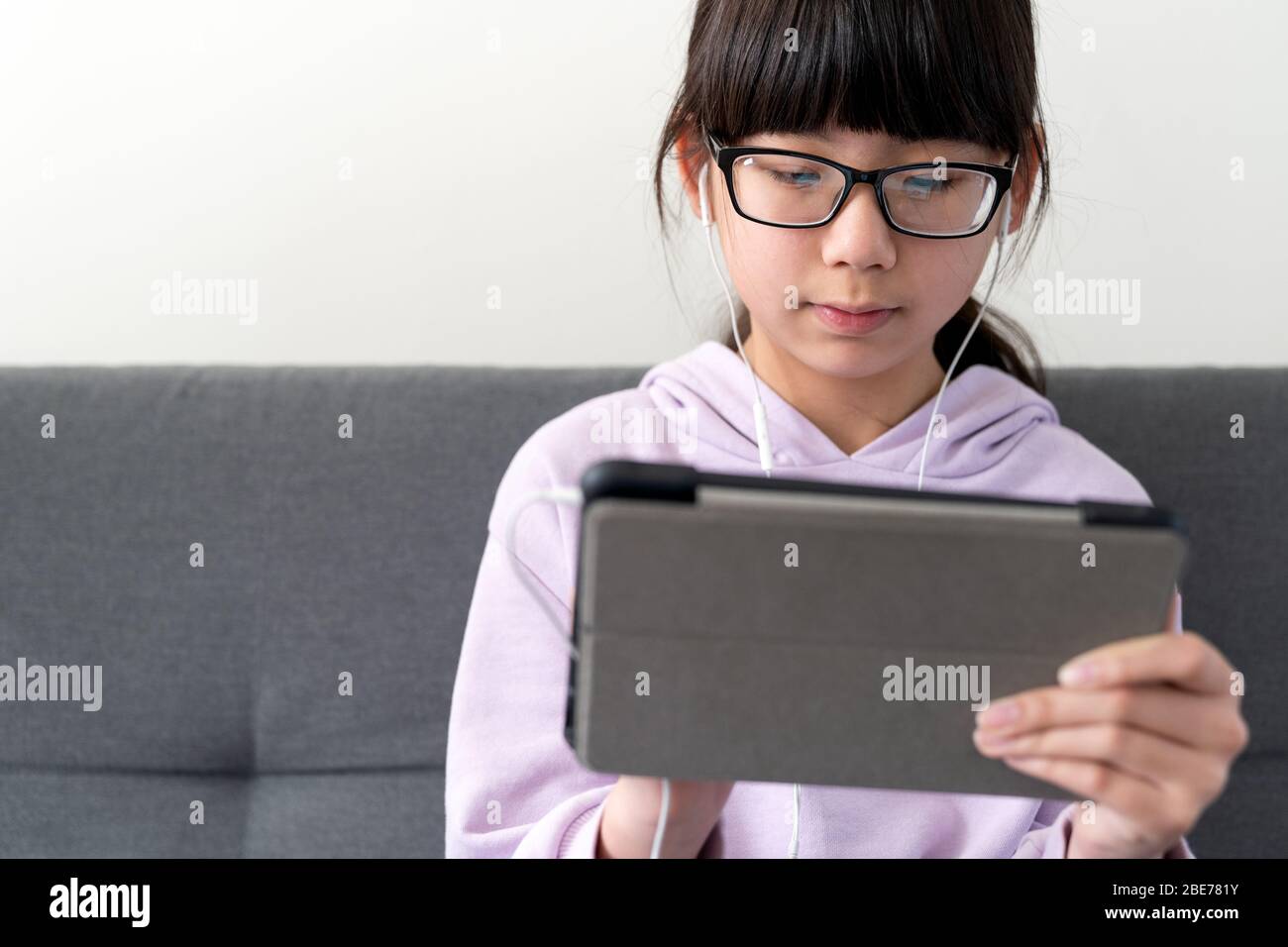 Asian teen girl tablet hi-res stock photography and images - Alamy