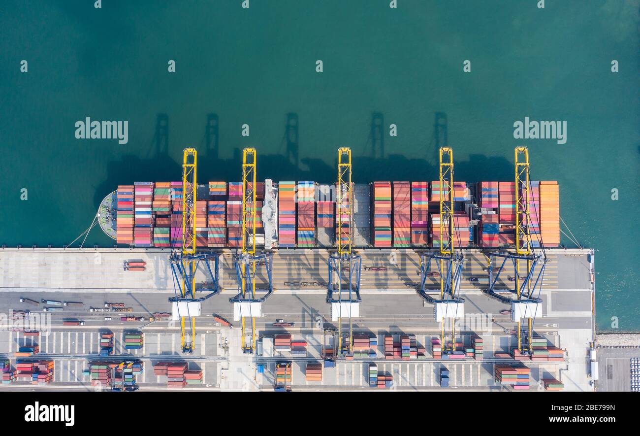 Aerial view container ship to sea port loading container for import ...