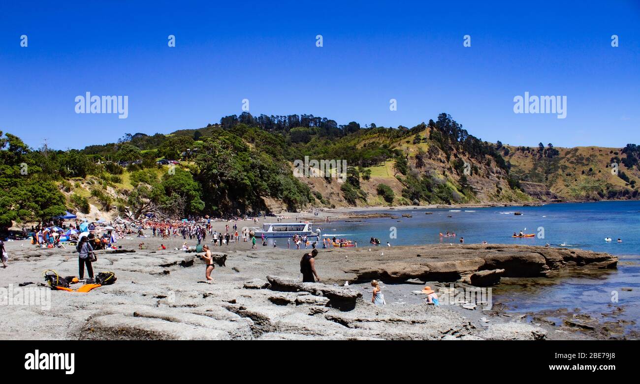 Beach scenery with people bathing across Goat Island Marine Reserve ...