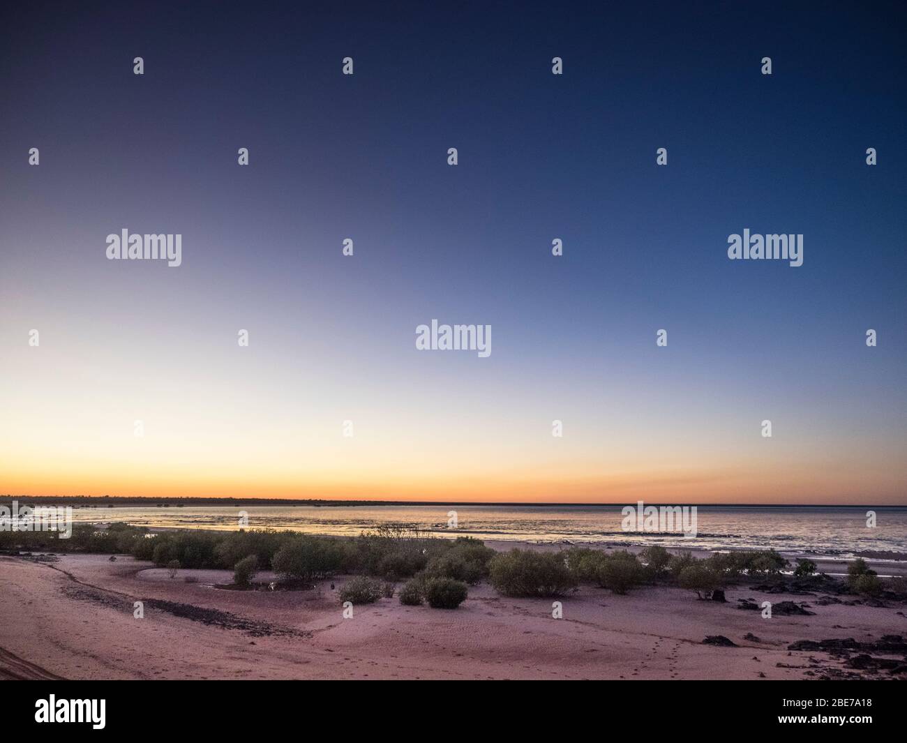 Sunrise over mudflats and mangroves of Roebuck Bay, Broome, The ...