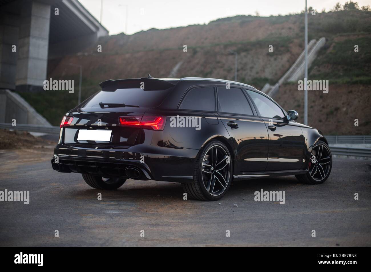 Black offroader parked under the bridge Stock Photo - Alamy