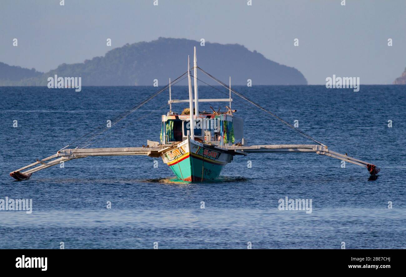 Large double outrigger wooden hulls of the Philippines Stock Photo - Alamy