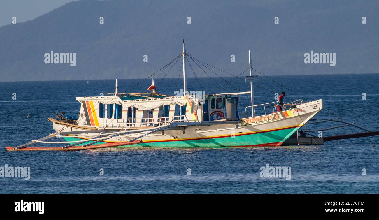 Large double outrigger wooden hulls of the Philippines Stock Photo - Alamy