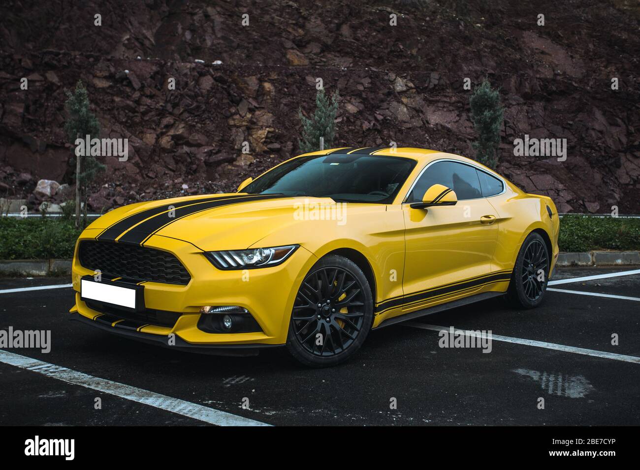 Yellow sport model car on the parking zone with black tuning Stock ...