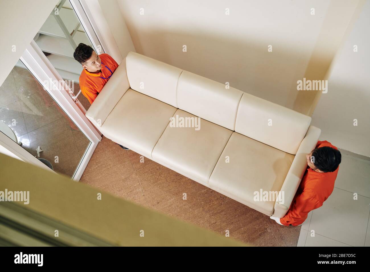 Carrying heavy furniture hi-res stock photography and images - Alamy