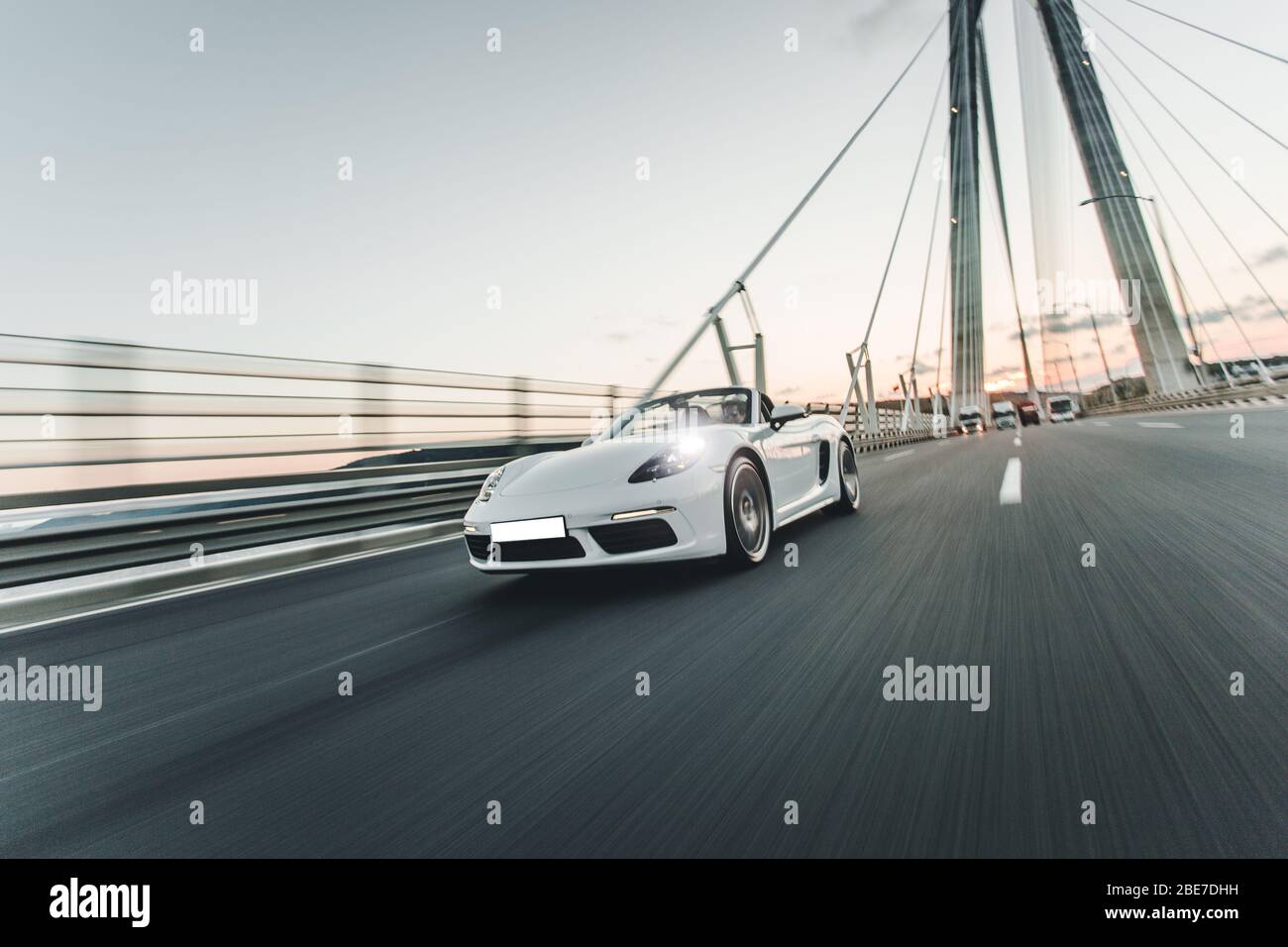 White super model car over the bridge, front view Stock Photo - Alamy