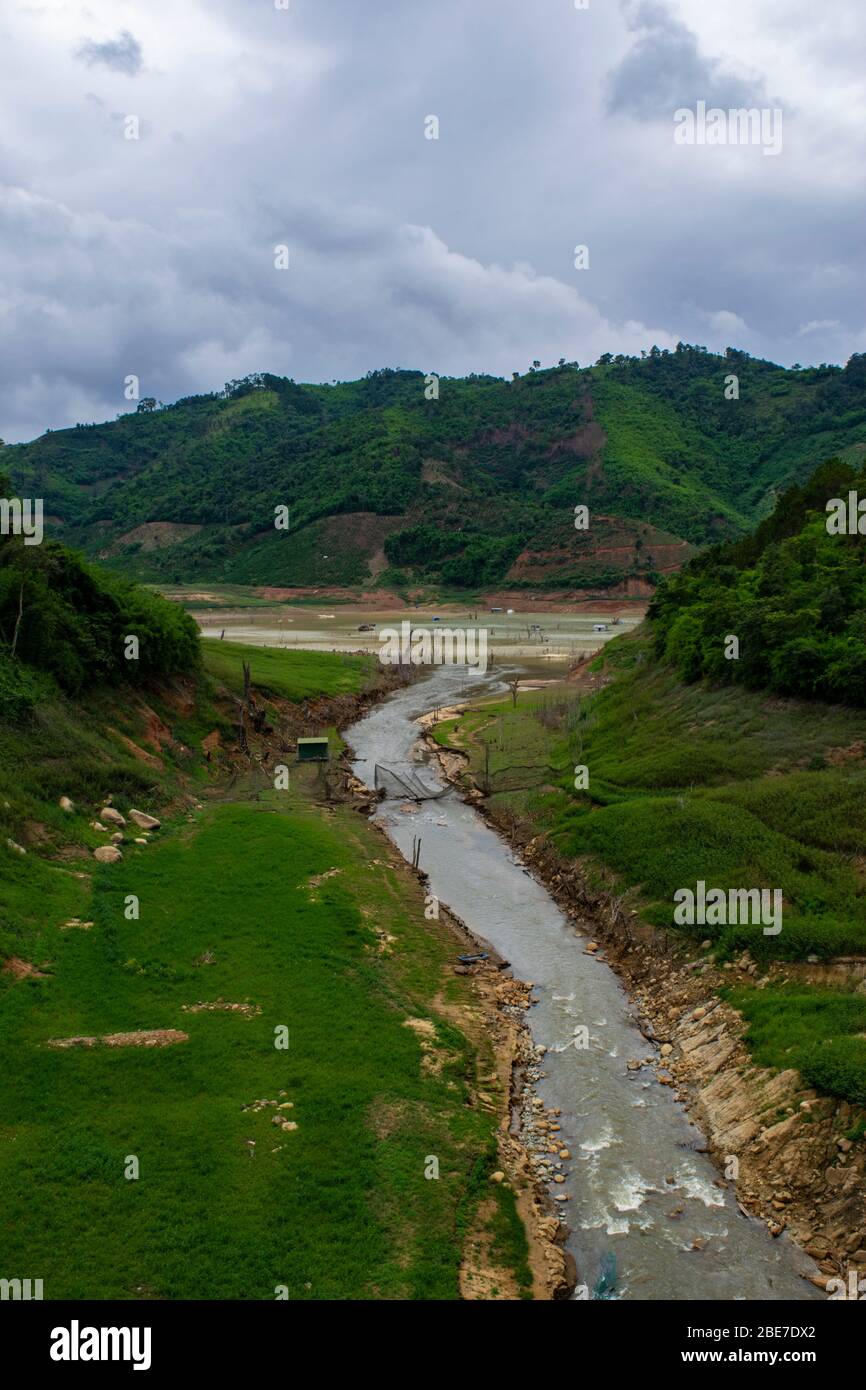 Rive leading into a half full Reservoir Stock Photo - Alamy