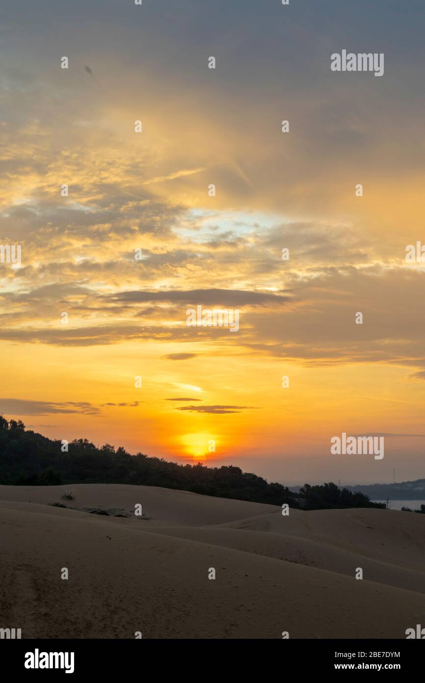 Sunrise over Sand Dunes in Mui Ne Stock Photo - Alamy
