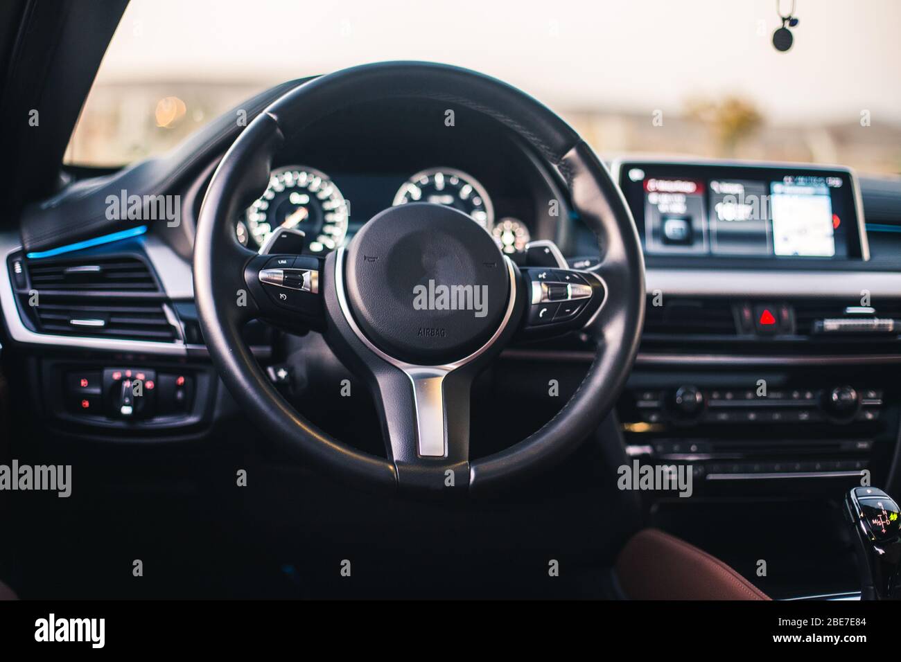 Control wheel and meter system of a car interior Stock Photo - Alamy