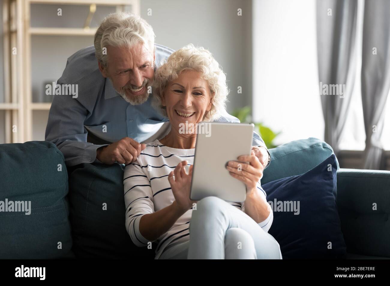 Happy mature spouses using hi-res stock photography and images - Alamy
