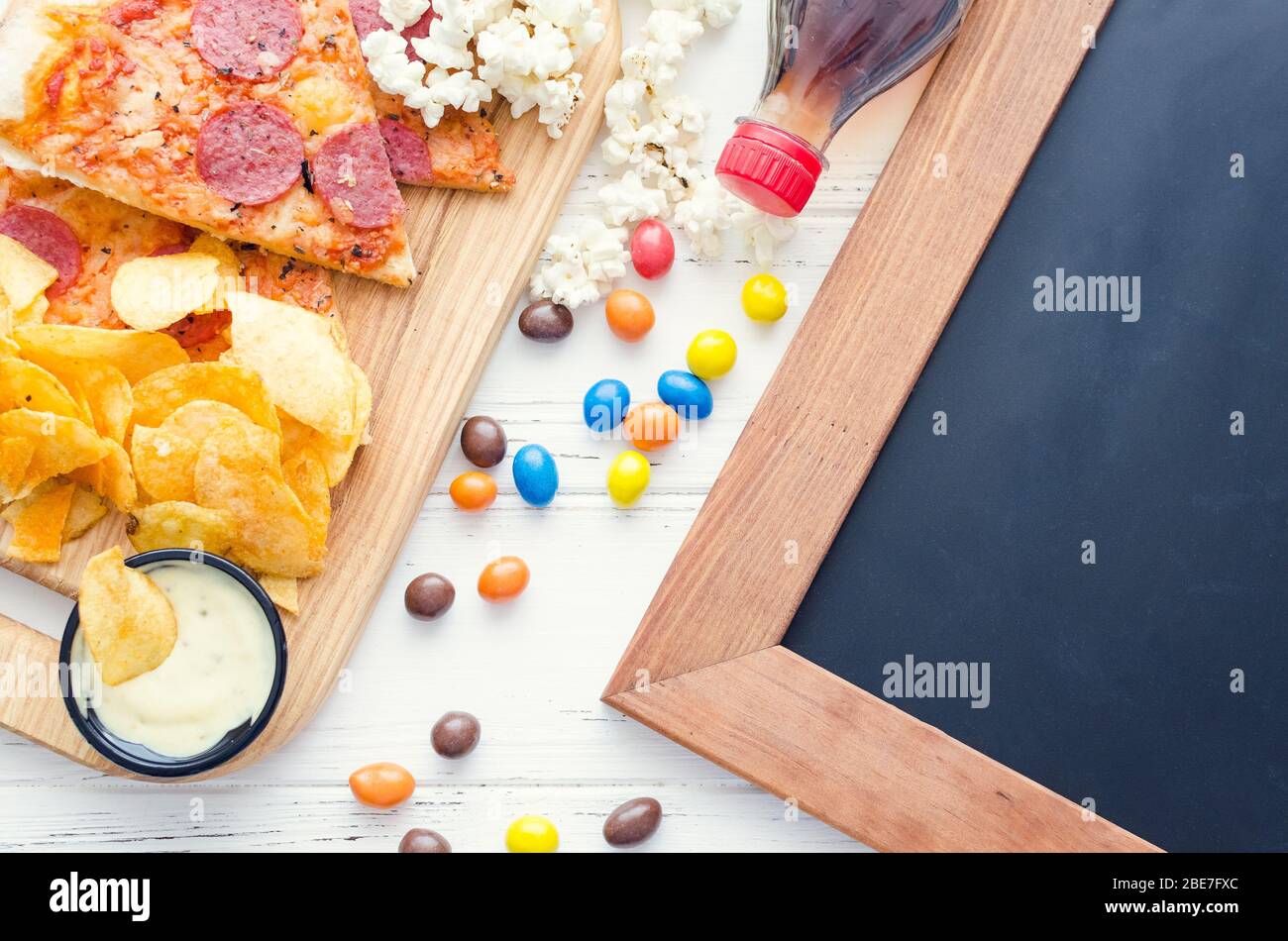 Fast food and unhealthy eating concept. Close up of fastfood snacks ...