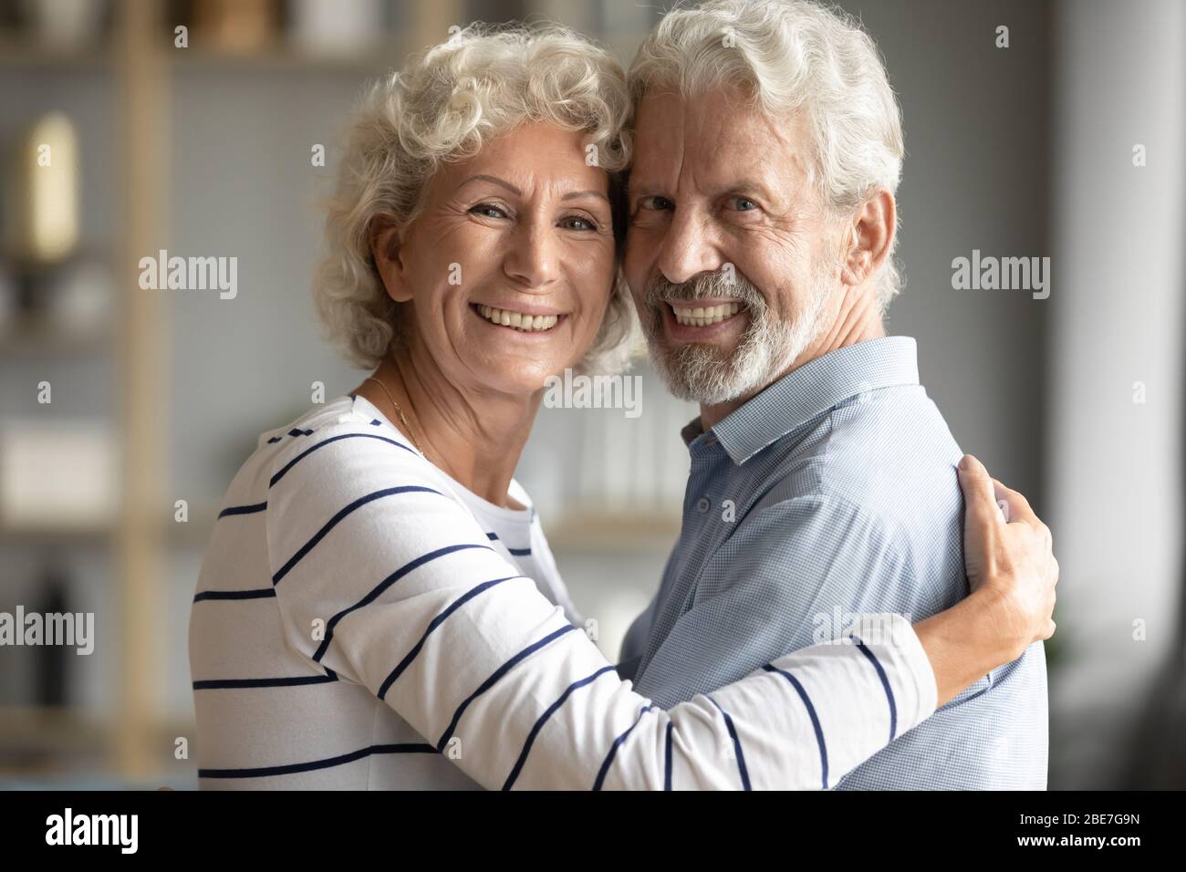 Head shot portrait happy older couple hugging, looking at camera Stock ... Head shot portrait happy older couple hugging, looking at camera Stock ...