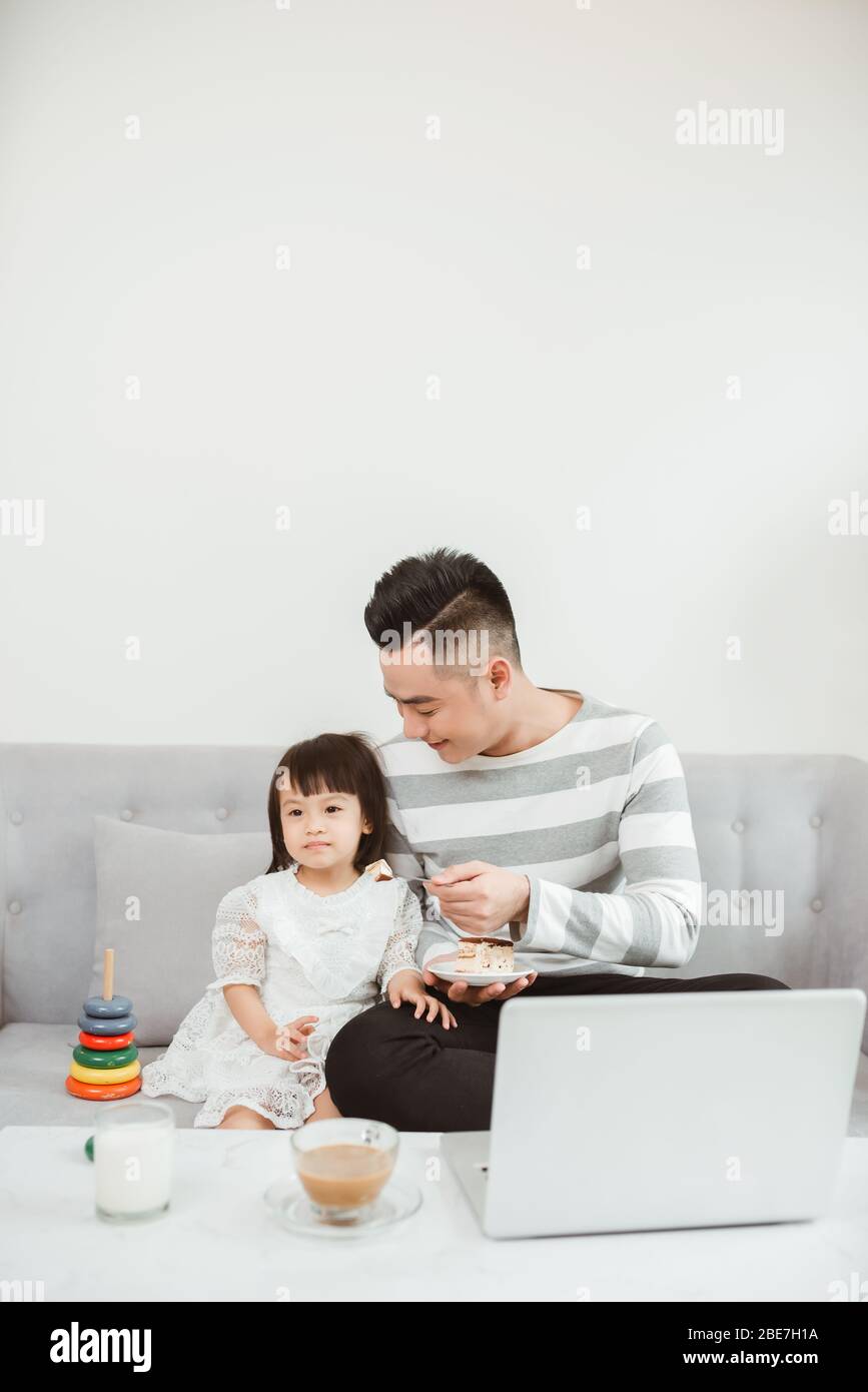 Daughter giving dad cake cake hi-res stock photography and images - Alamy