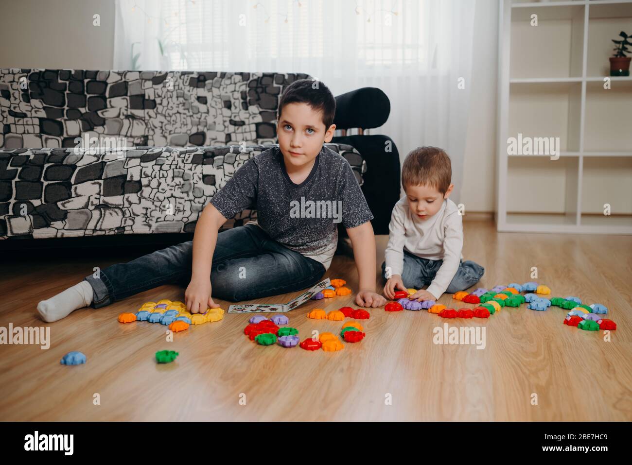 Kids engaged in funny activity. Family weekend concept Stock Photo - Alamy