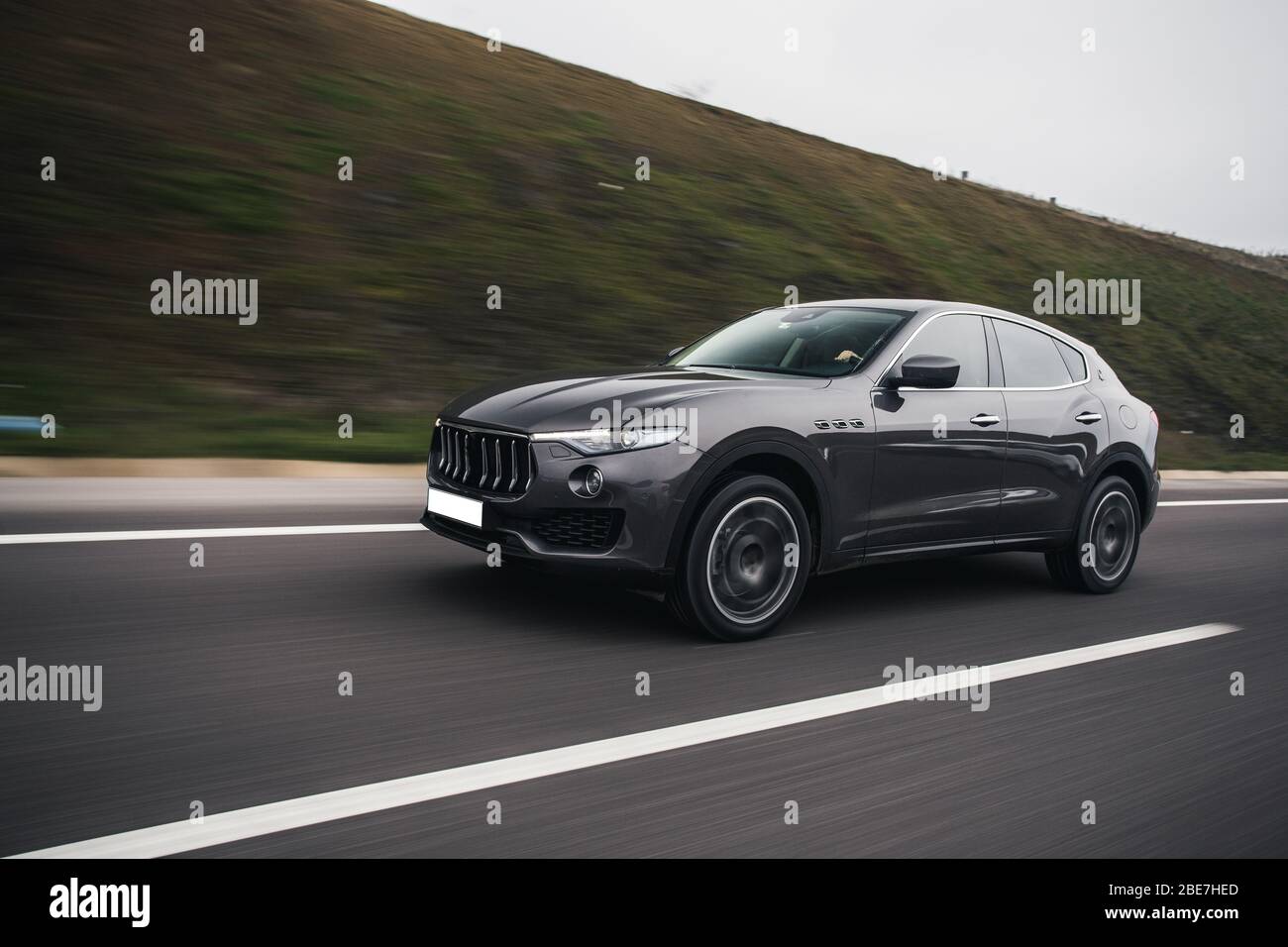 Black offroader high speed drive across hills Stock Photo - Alamy