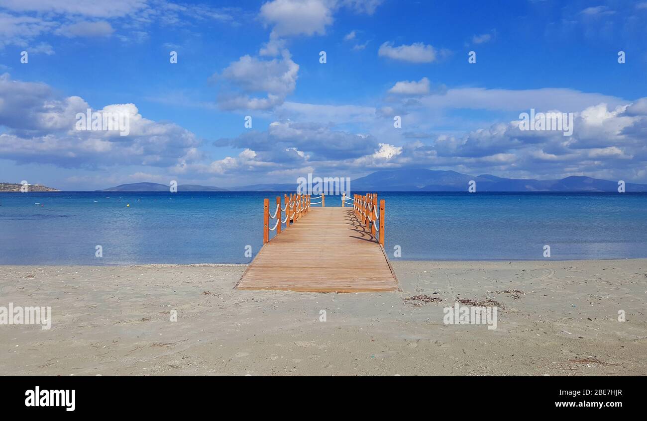 Tropical beach and pier in Cesme in Turkey Stock Photo - Alamy