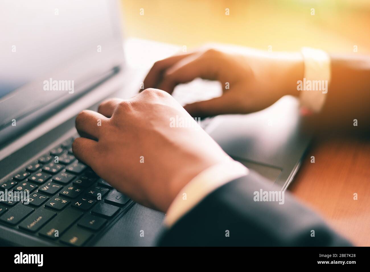 Male hand typing on keyboard concept / Businessman working on keyboard ...