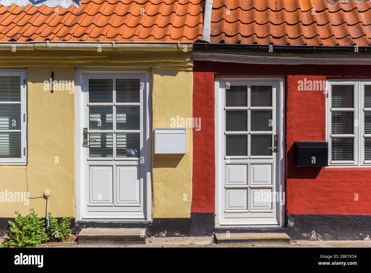 Red and yellow houses in the historic streets of Tonder, Denmark Stock ...
