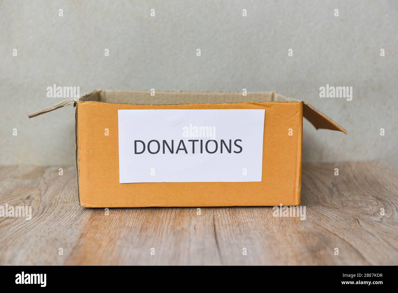 Donations box on wooden table background / donate concept Stock Photo ...