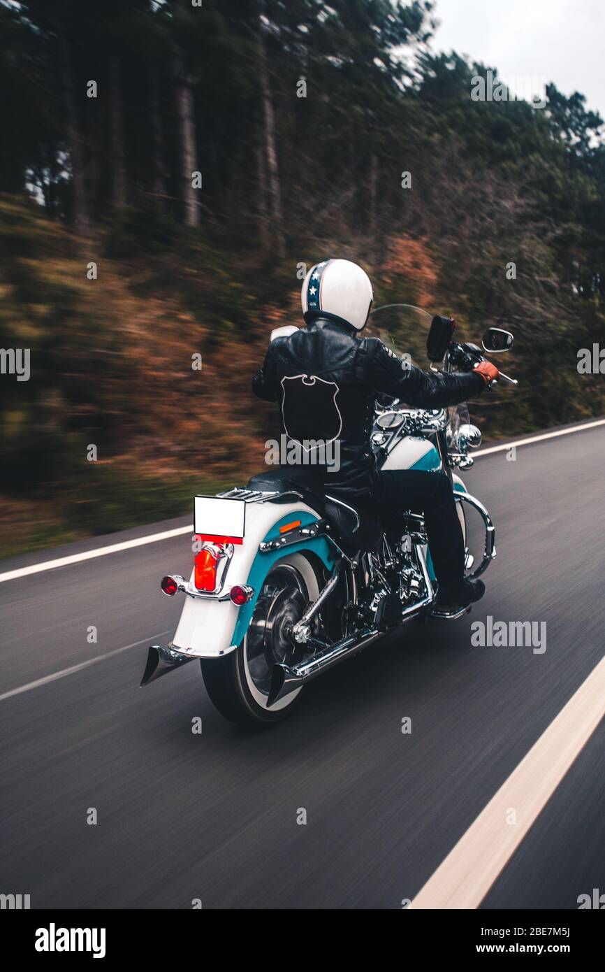 Driving blue motorcycle on the highway, back view Stock Photo - Alamy