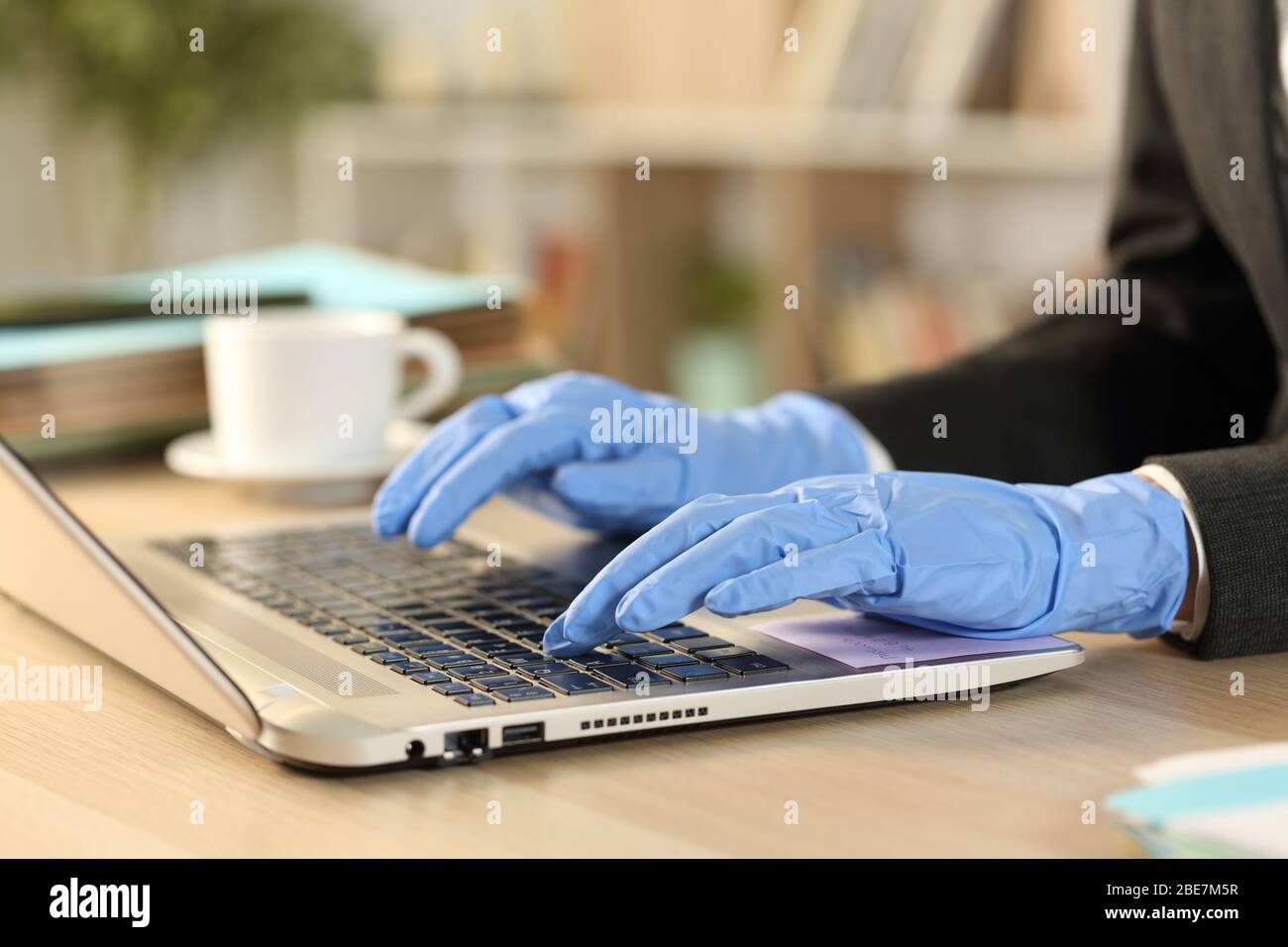 Computer keyboard hands gloves typing hi-res stock photography and ...
