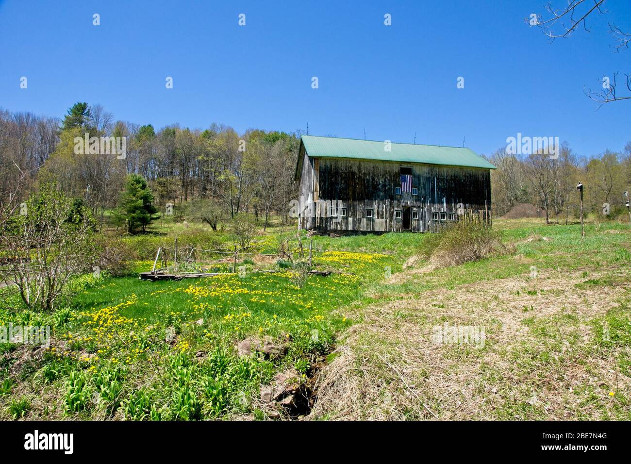 Upstate New York Barn with American Flag Stock Photo - Alamy