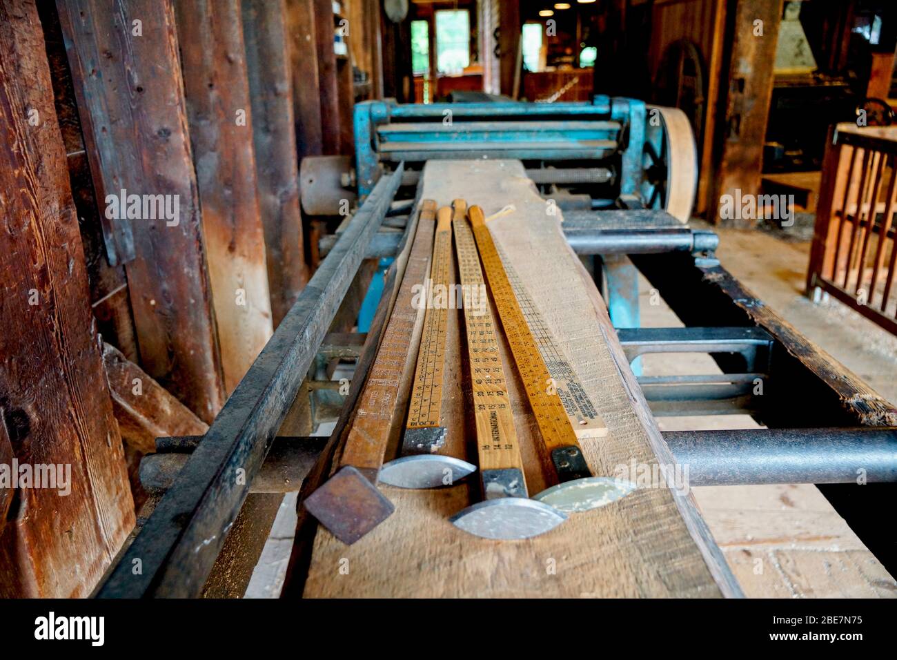 Yard sticks to measure lengths of wood in old mill Stock Photo - Alamy