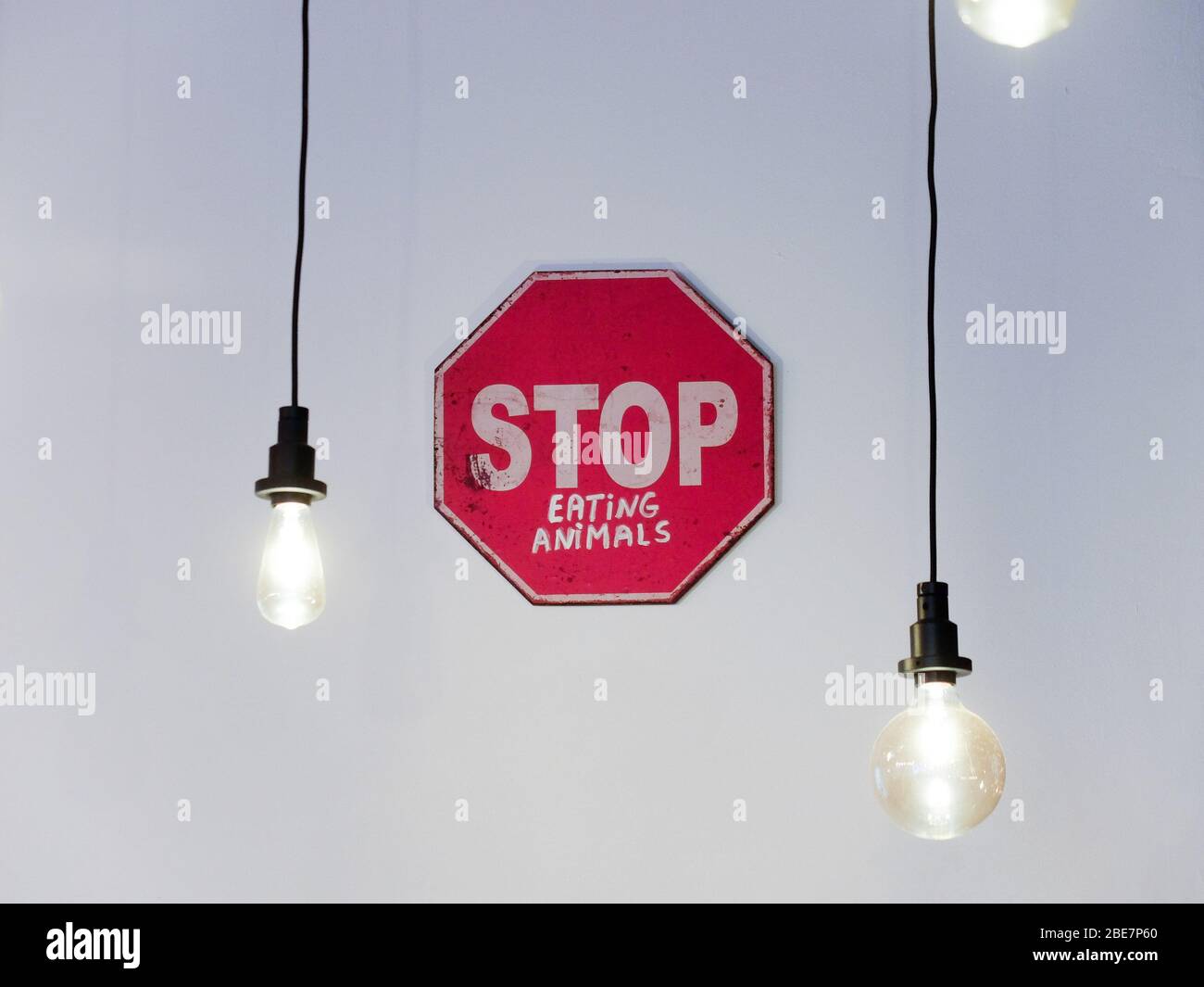 Stop eating animals red sign Stock Photo - Alamy