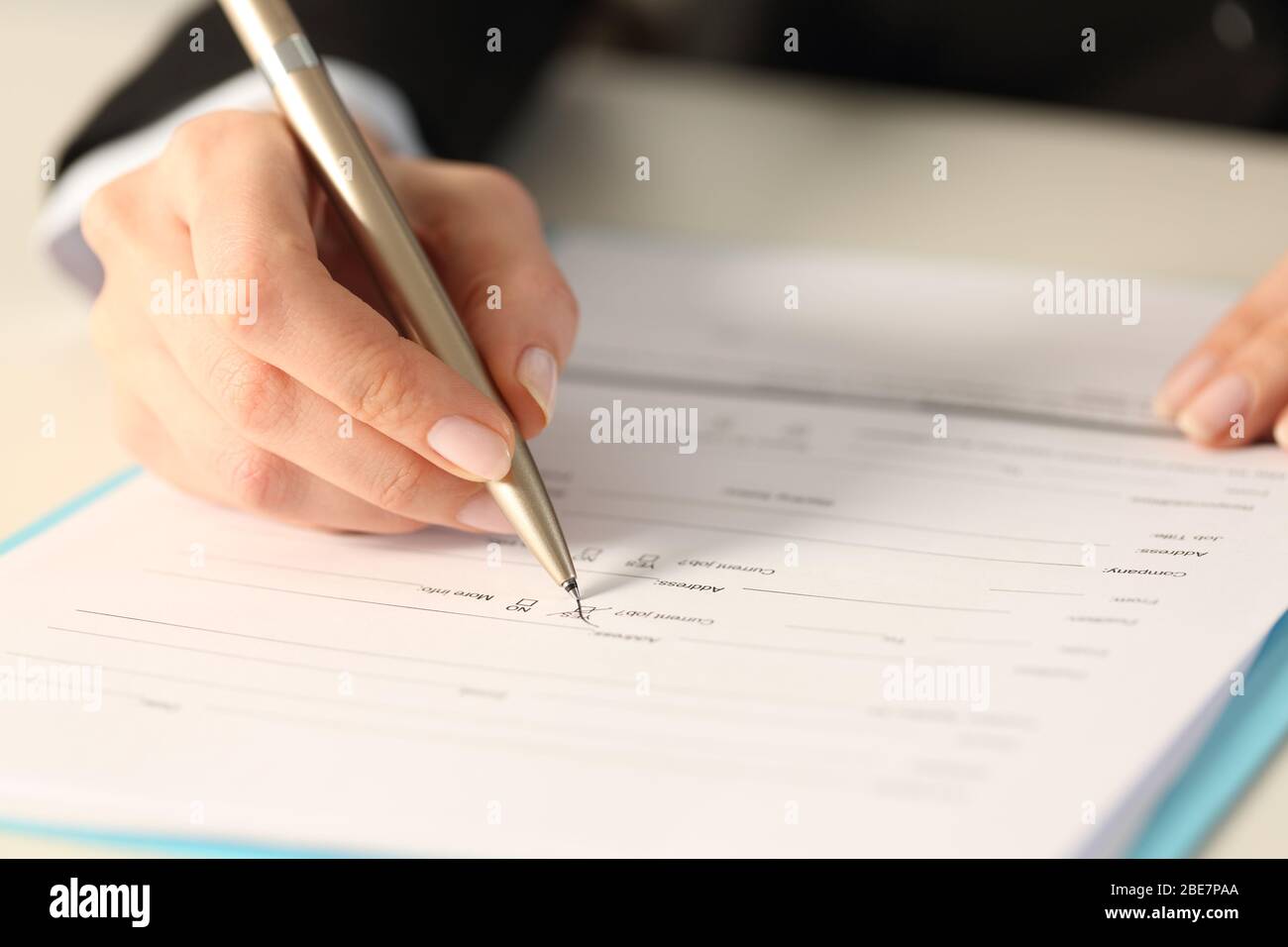 Close up of executive woman hand filling form checking yes checkbox ...