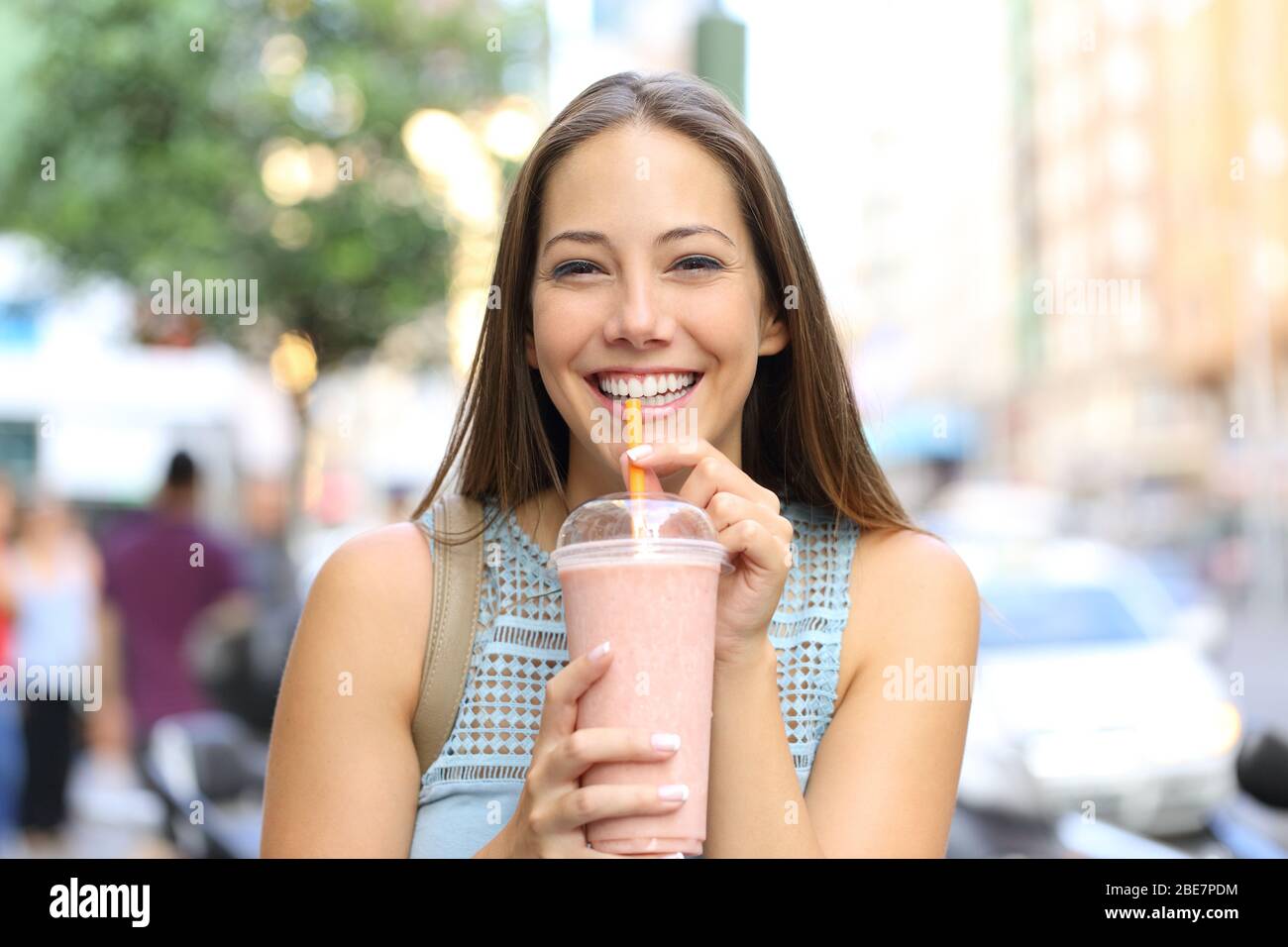 Girl enjoying a milkshake hi-res stock photography and images - Alamy