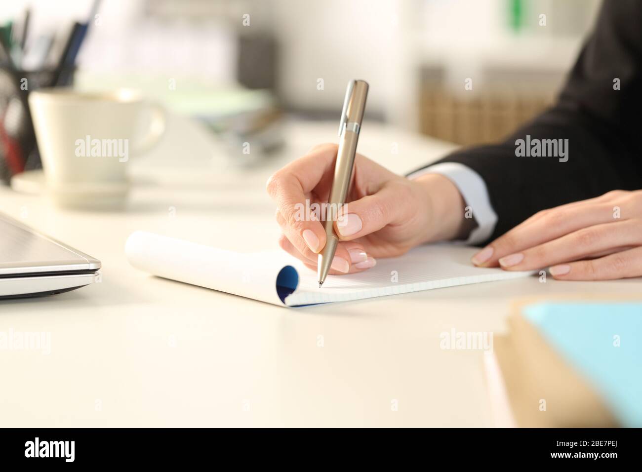 Female executive writing hi-res stock photography and images - Alamy