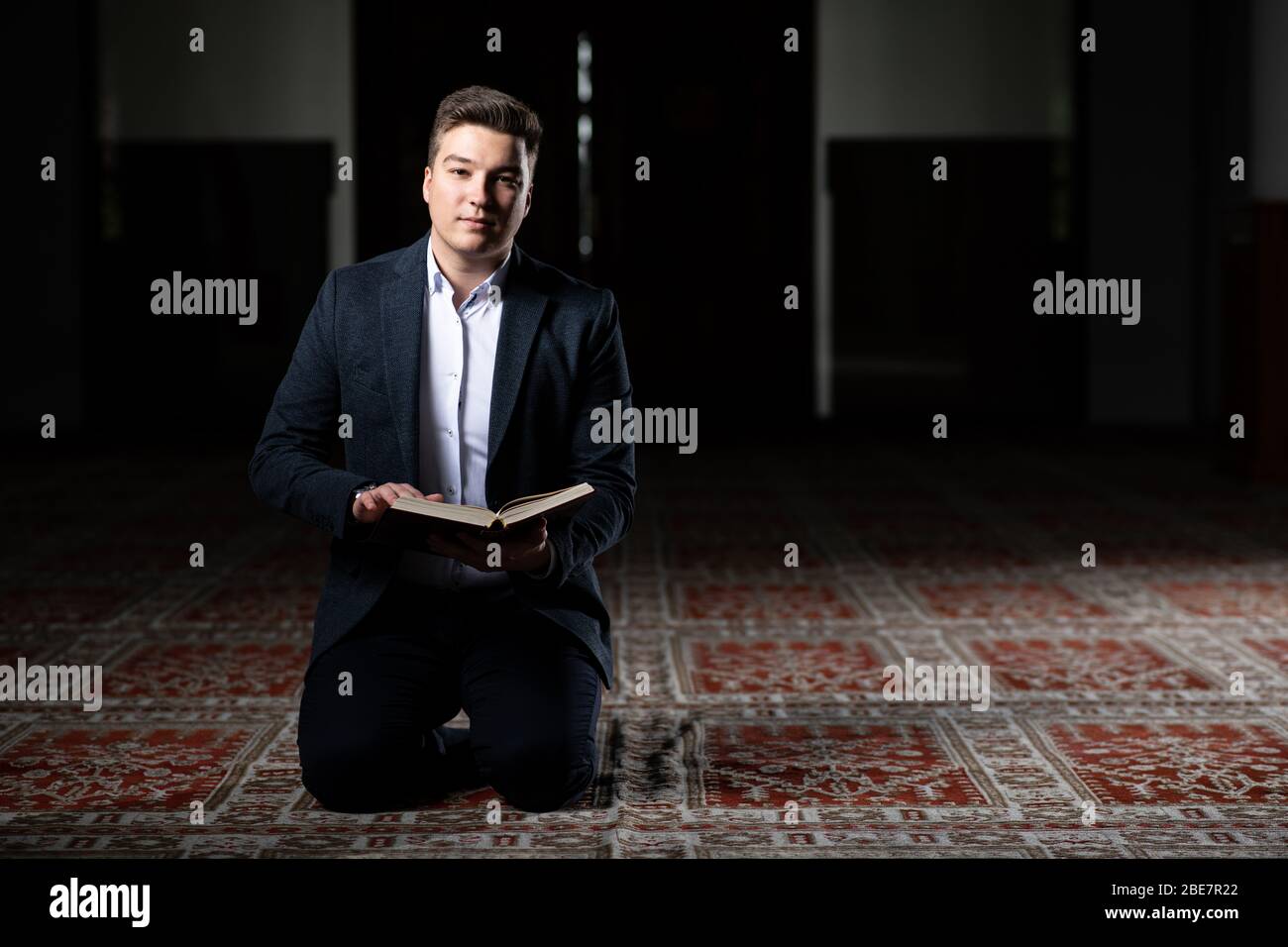 Attractive Man Making Traditional Prayer to God Allah in the Mosque ...