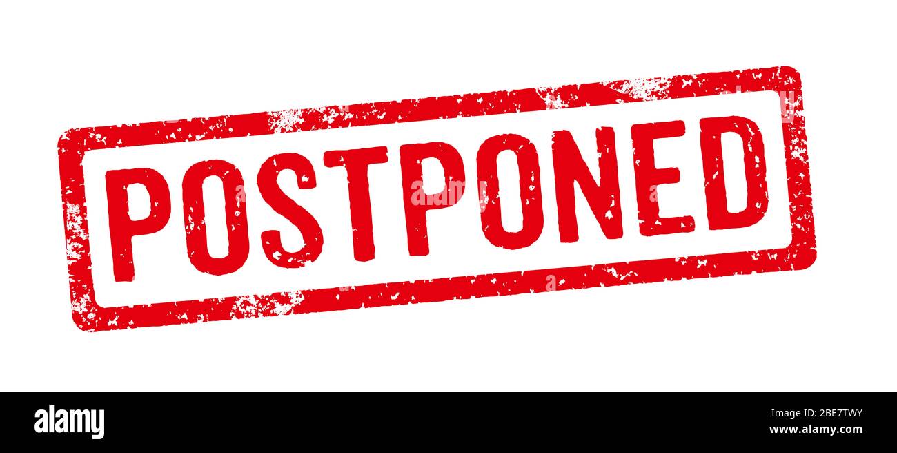 A red stamp on a white background - Postponed Stock Photo - Alamy