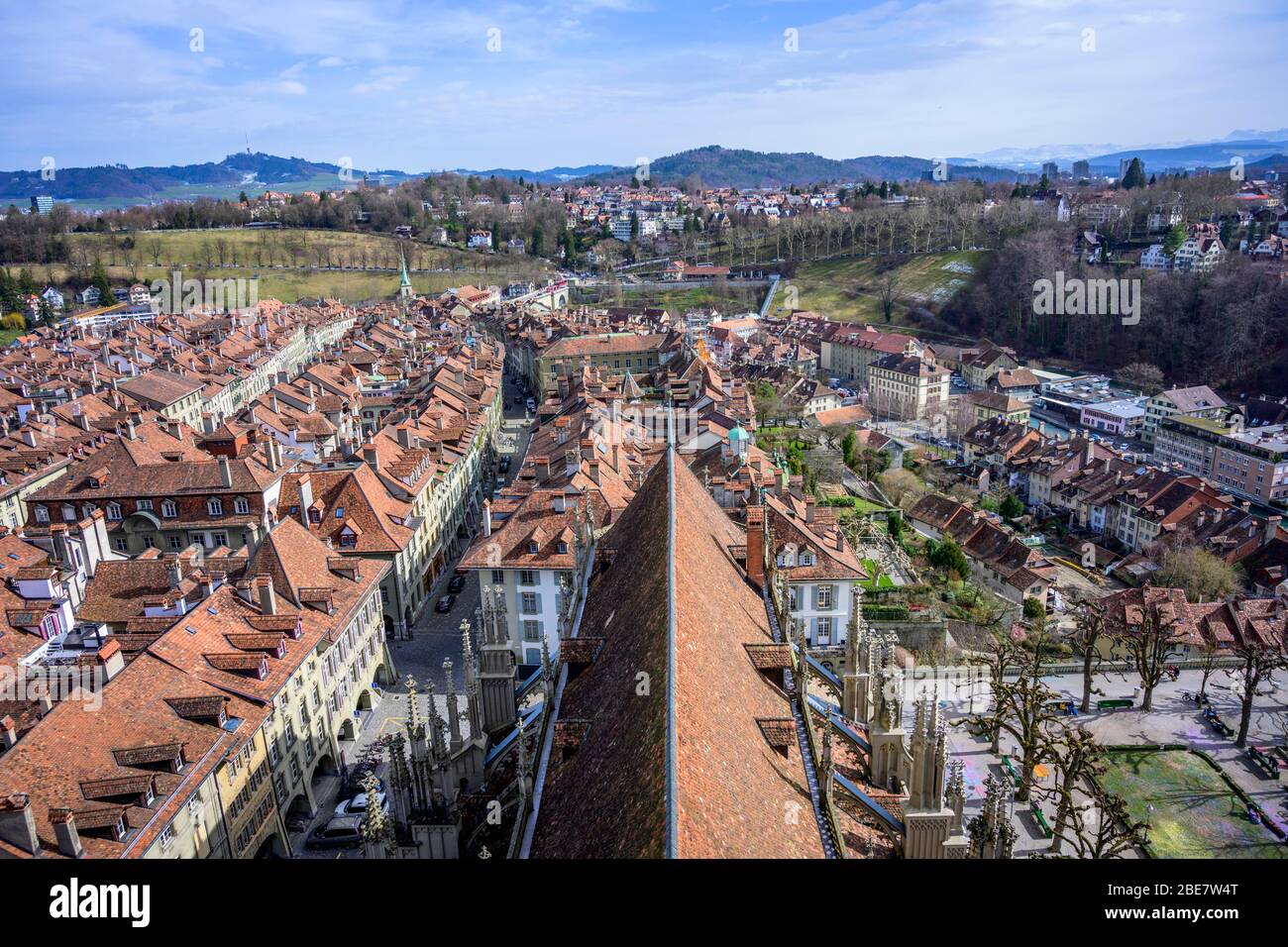 View from Bern Cathedral to the red tiled roofs of the houses in the ...