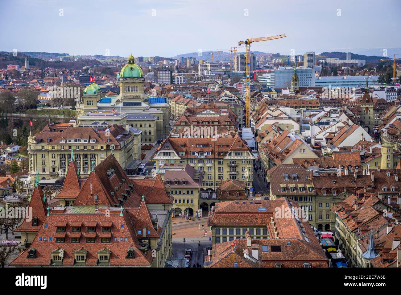View from Bern Cathedral to the red tiled roofs of the houses in the ...