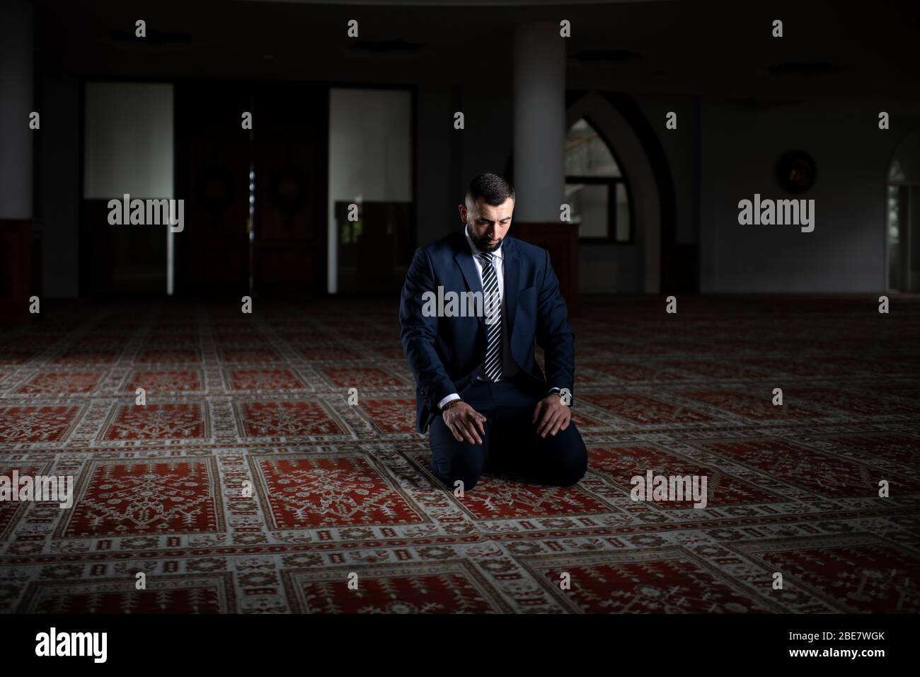 Attractive Man Making Traditional Prayer to God Allah in the Mosque ...