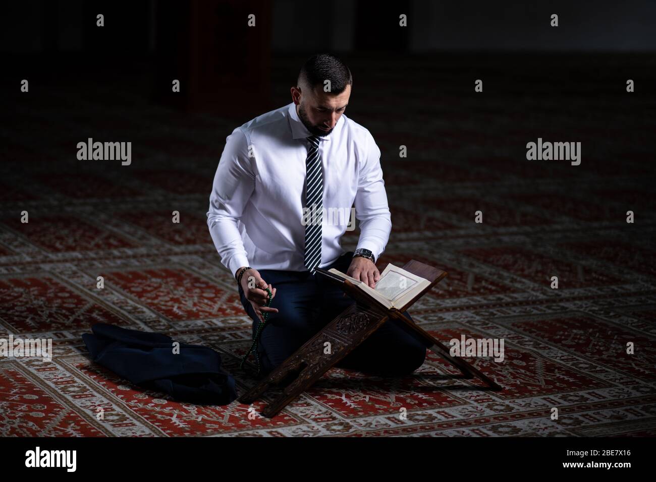 Attractive Man Making Traditional Prayer to God Allah in the Mosque ...