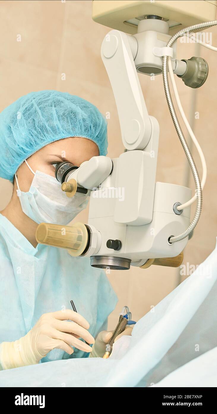 Ophthalmology laser microscope operation. Doctor clinic. Patient eye ...